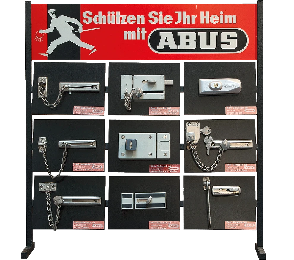 A stand with a poster showing the headline "Protect your home with ABUS ...